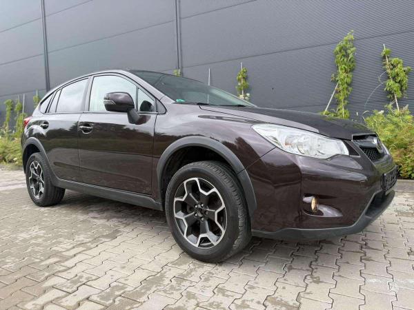 Brown Subaru XV 2013 in Vilnius, with an engine capacity of 1.60 L and mileage of 160 thousand km for 6990 €, photo 8 on AUTOMOTO.COM.LV