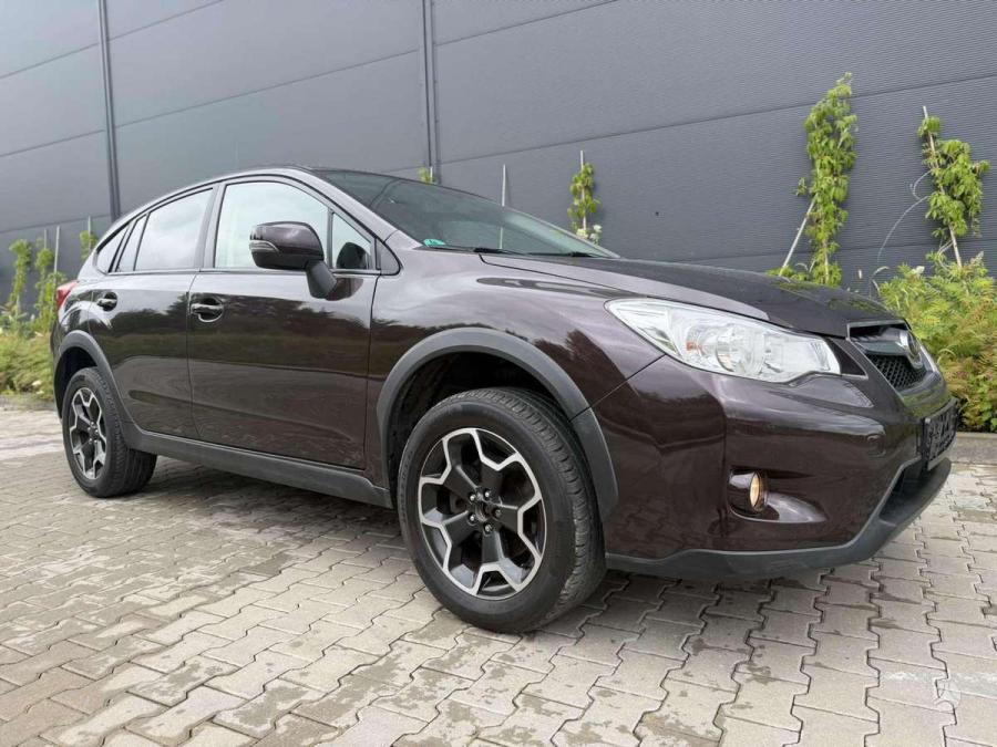 Brown Subaru XV 2013 in Vilnius, with an engine capacity of 1.60 L and mileage of 160 thousand km for 6990 €, photo 9 on AUTOMOTO.COM.LV