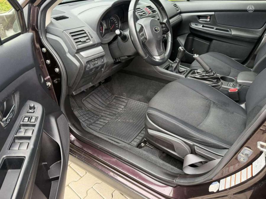 Brown Subaru XV 2013 in Vilnius, with an engine capacity of 1.60 L and mileage of 160 thousand km for 6990 €, photo 12 on AUTOMOTO.COM.LV
