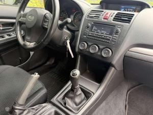 Brown Subaru XV 2013 in Vilnius, with an engine capacity of 1.60 L and mileage of 160 thousand km for 6990 €, photo 16 on AUTOMOTO.COM.LV