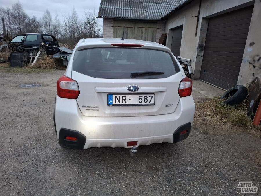Subaru XV 2013 in Panevezys, with an engine capacity of 2.00 L and mileage of 275 thousand km for 6900 €, photo 5 on AUTOMOTO.COM.LV