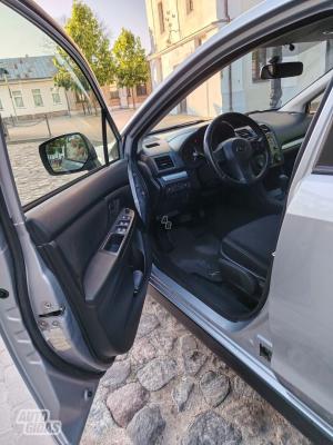 Subaru XV 2013 in Ukmerge, with an engine capacity of 2.00 L and mileage of 272 thousand km for 5750 €, photo 14 on AUTOMOTO.COM.LV