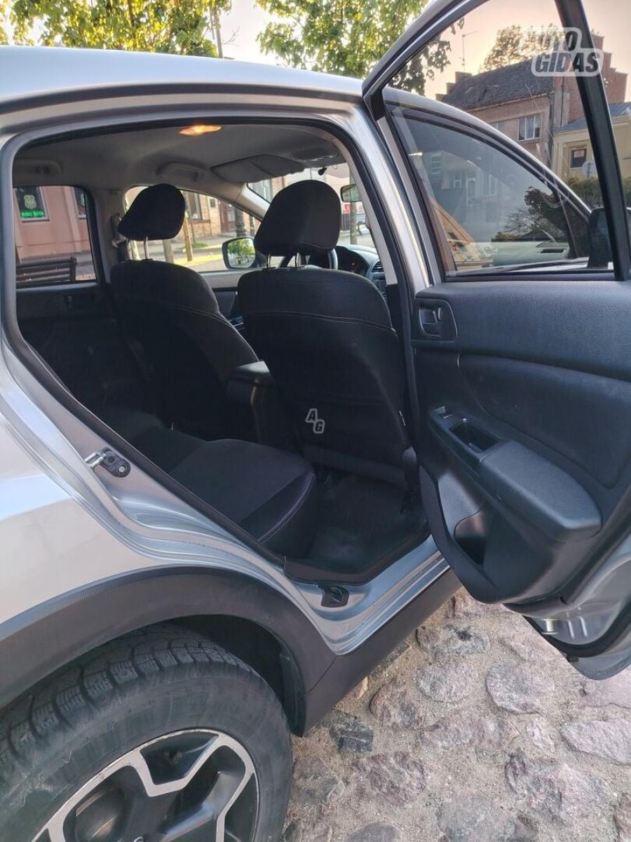 Subaru XV 2013 in Ukmerge, with an engine capacity of 2.00 L and mileage of 272 thousand km for 5750 €, photo 16 on AUTOMOTO.COM.LV