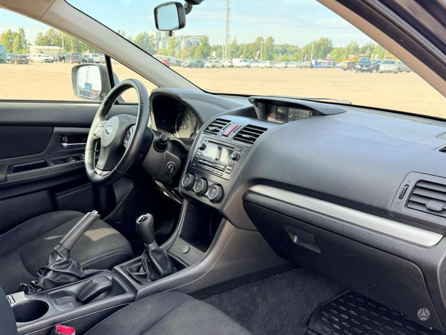 Grey Subaru XV 2012 in Panevezys, with an engine capacity of 1.60 L and mileage of 269 thousand km for 4900 €, photo 14 on AUTOMOTO.COM.LV