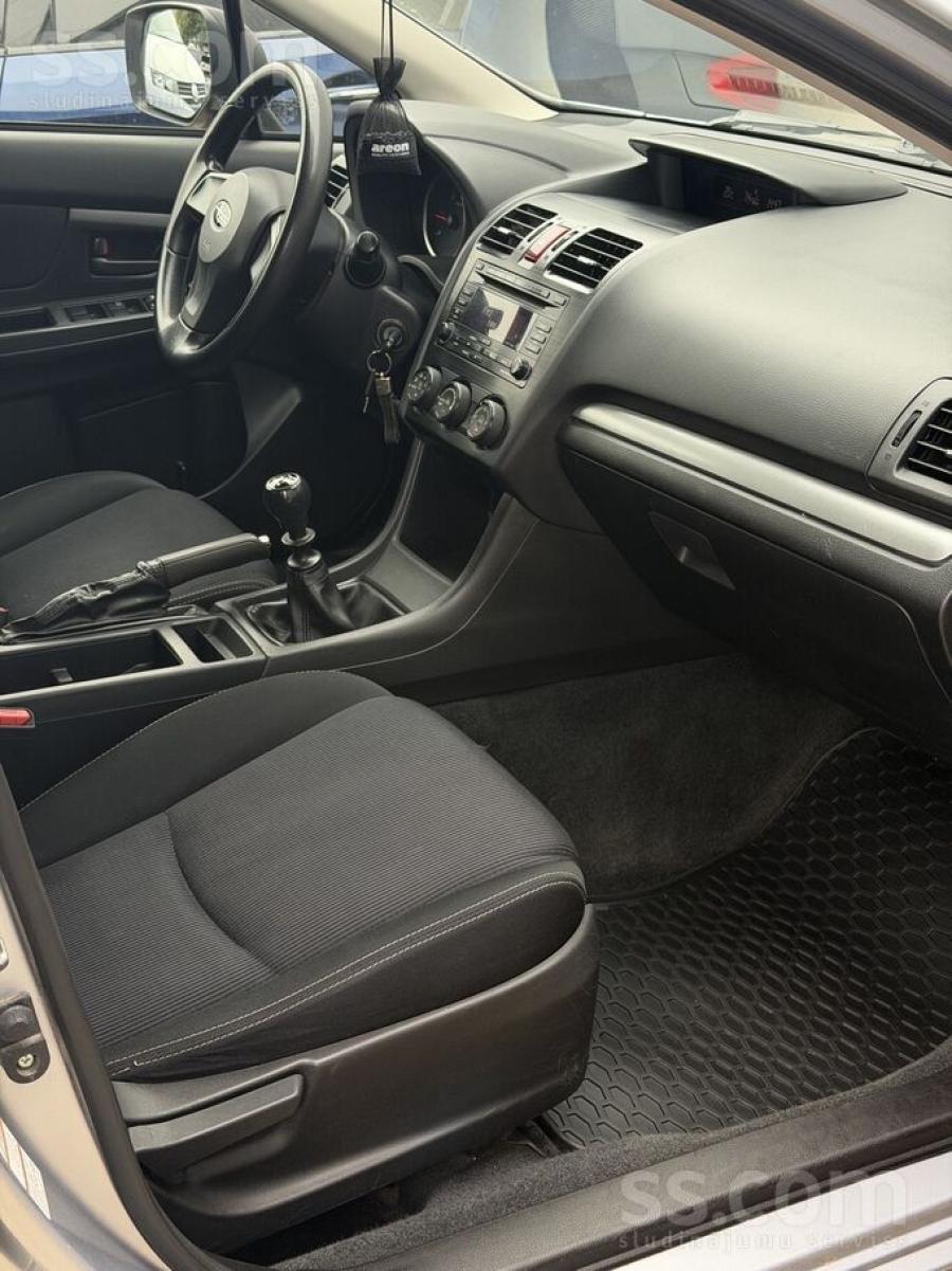 Grey Subaru XV 2012 in Riga, with an engine capacity of 2.00 L and mileage of 323 thousand km for 2580 €, photo 9 on AUTOMOTO.COM.LV
