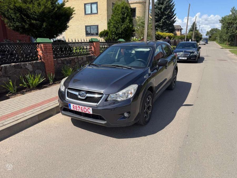 Grey Subaru XV 2013 in Panevezys, with an engine capacity of 2.00 L and mileage of 95 thousand km for 4800 €, photo 1 on AUTOMOTO.COM.LV