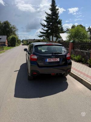 Grey Subaru XV 2013 in Panevezys, with an engine capacity of 2.00 L and mileage of 95 thousand km for 4800 €, photo 5 on AUTOMOTO.COM.LV
