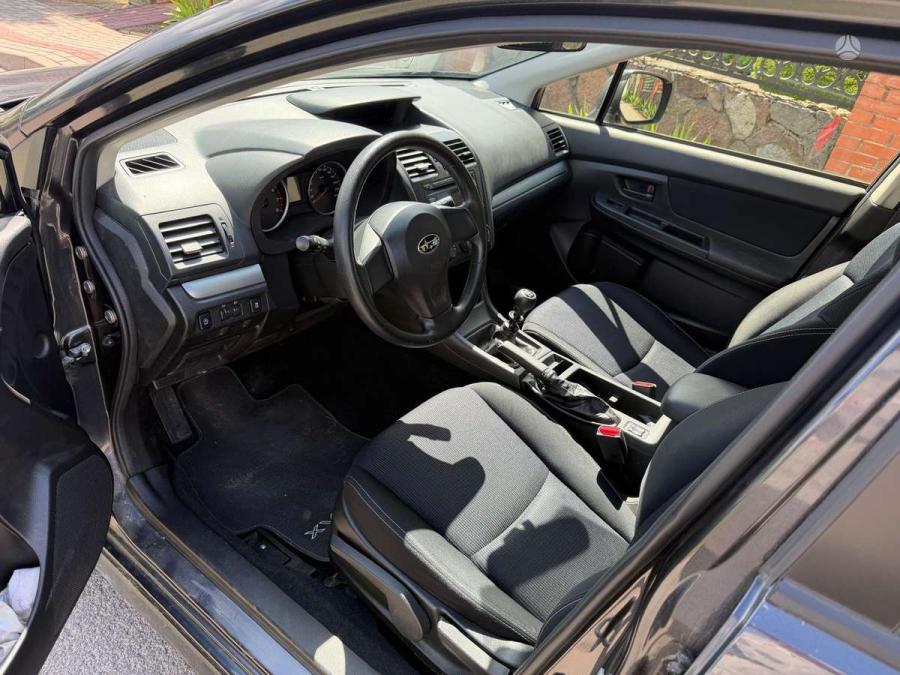 Grey Subaru XV 2013 in Panevezys, with an engine capacity of 2.00 L and mileage of 95 thousand km for 4800 €, photo 8 on AUTOMOTO.COM.LV