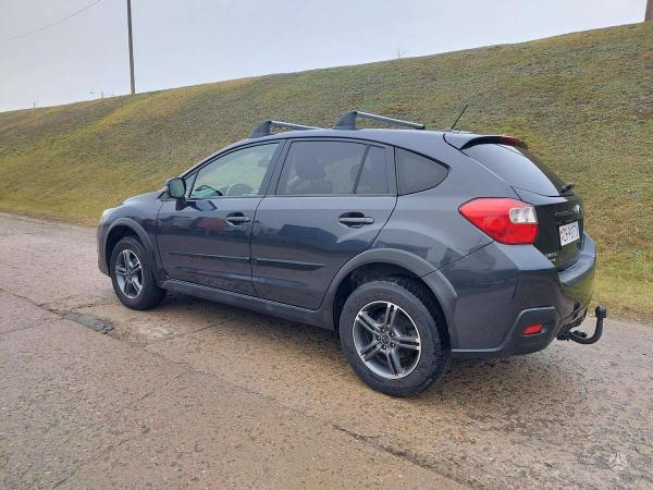 Grey Subaru XV 2014 in Vilnius, with an engine capacity of 2.00 L and mileage of 216 thousand km for 7800 €, photo 4 on AUTOMOTO.COM.LV