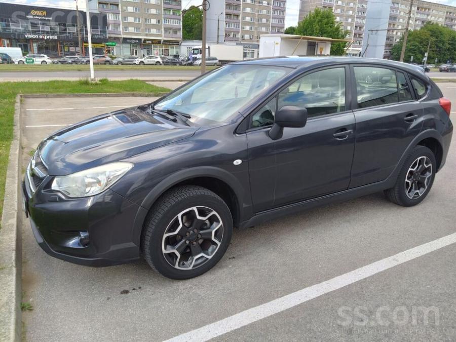 Grey Subaru XV 2014 in Riga, with an engine capacity of 2.00 L and mileage of 220 thousand km for 6500 €, photo 3 on AUTOMOTO.COM.LV