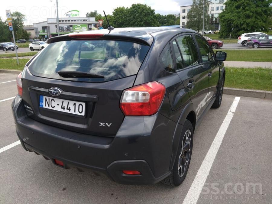 Grey Subaru XV 2014 in Riga, with an engine capacity of 2.00 L and mileage of 220 thousand km for 6500 €, photo 4 on AUTOMOTO.COM.LV