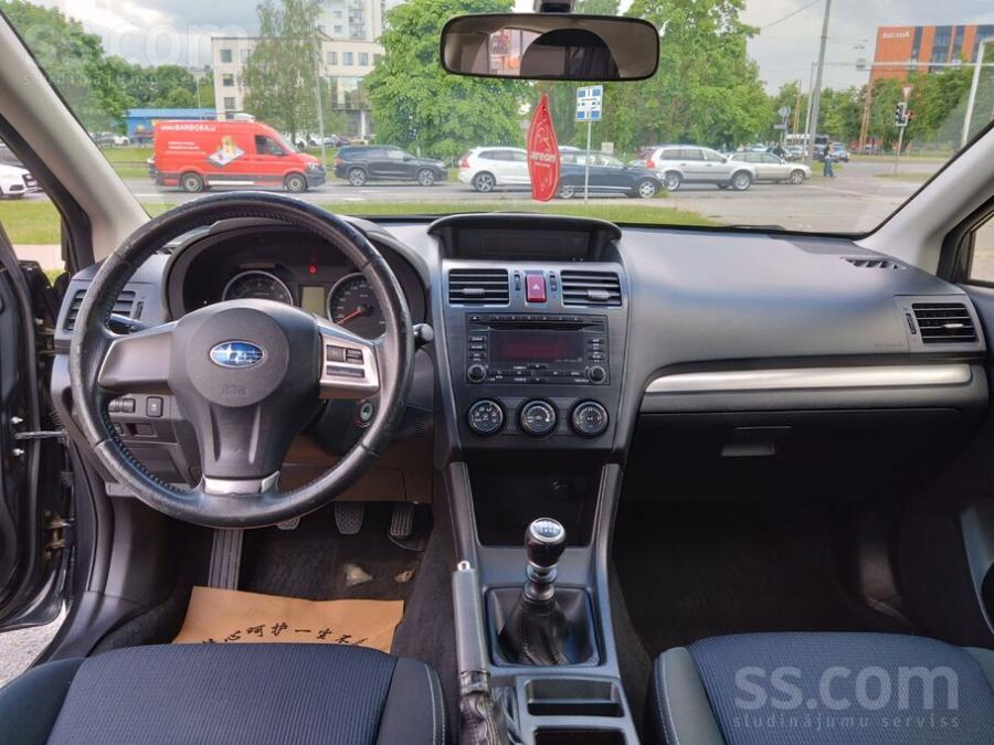 Grey Subaru XV 2014 in Riga, with an engine capacity of 2.00 L and mileage of 220 thousand km for 6500 €, photo 8 on AUTOMOTO.COM.LV