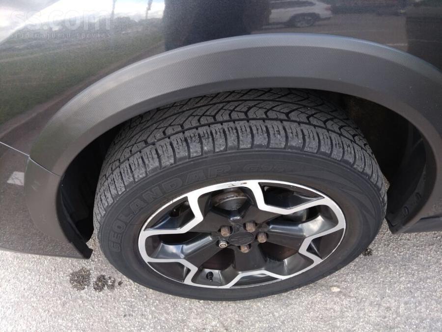 Grey Subaru XV 2014 in Riga, with an engine capacity of 2.00 L and mileage of 220 thousand km for 6500 €, photo 18 on AUTOMOTO.COM.LV