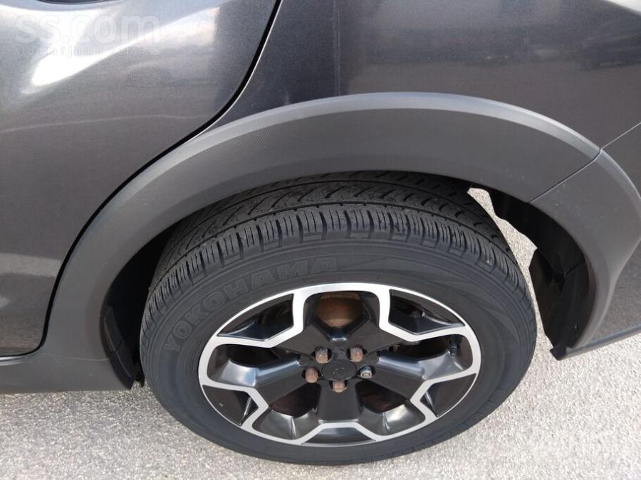 Grey Subaru XV 2014 in Riga, with an engine capacity of 2.00 L and mileage of 220 thousand km for 6500 €, photo 19 on AUTOMOTO.COM.LV