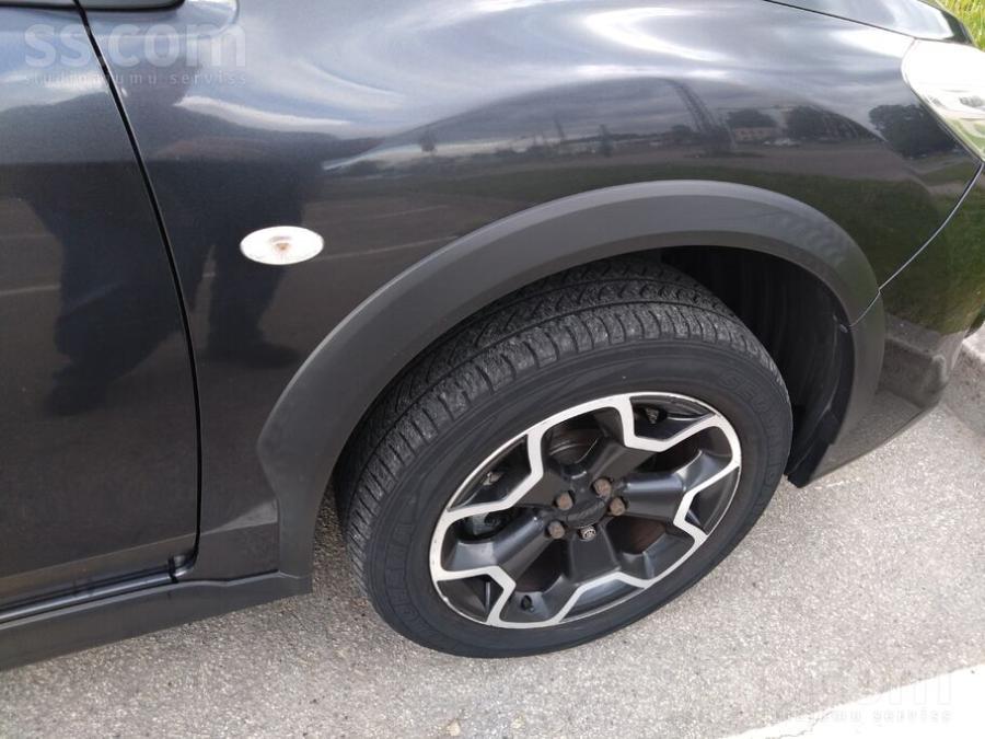 Grey Subaru XV 2014 in Riga, with an engine capacity of 2.00 L and mileage of 220 thousand km for 6500 €, photo 21 on AUTOMOTO.COM.LV