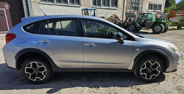 Grey Subaru XV 2014 in Kelme, with an engine capacity of 2.00 L and mileage of 159 thousand km for 2500 €, photo 9 on AUTOMOTO.COM.LV