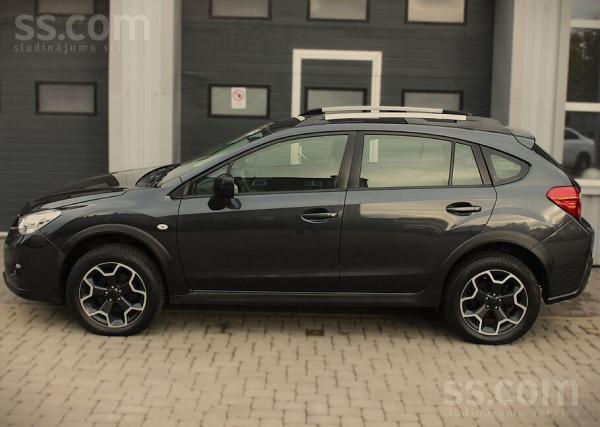 Grey Subaru XV 2014 in Riga, with an engine capacity of 2.00 L and mileage of 0 thousand km for 9750 €, photo 4 on AUTOMOTO.COM.LV