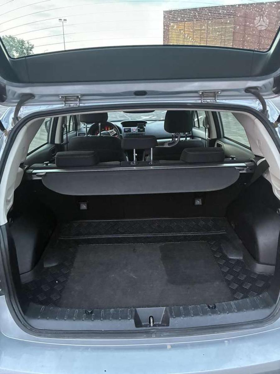 Grey Subaru XV 2015 in Taurage, with an engine capacity of 2.00 L and mileage of 138 thousand km for 5500 €, photo 8 on AUTOMOTO.COM.LV