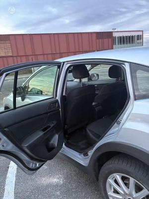 Grey Subaru XV 2015 in Taurage, with an engine capacity of 2.00 L and mileage of 138 thousand km for 5500 €, photo 9 on AUTOMOTO.COM.LV