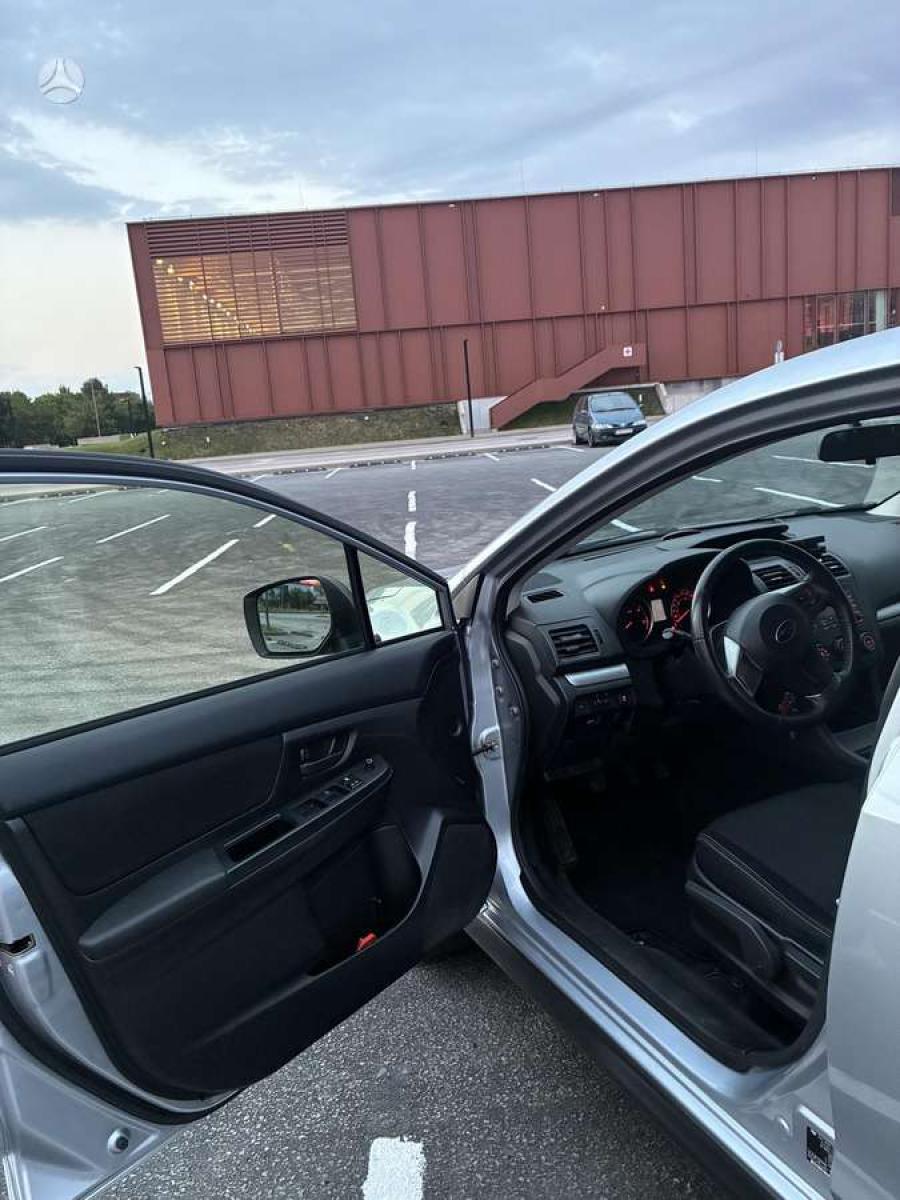 Grey Subaru XV 2015 in Taurage, with an engine capacity of 2.00 L and mileage of 138 thousand km for 5500 €, photo 12 on AUTOMOTO.COM.LV