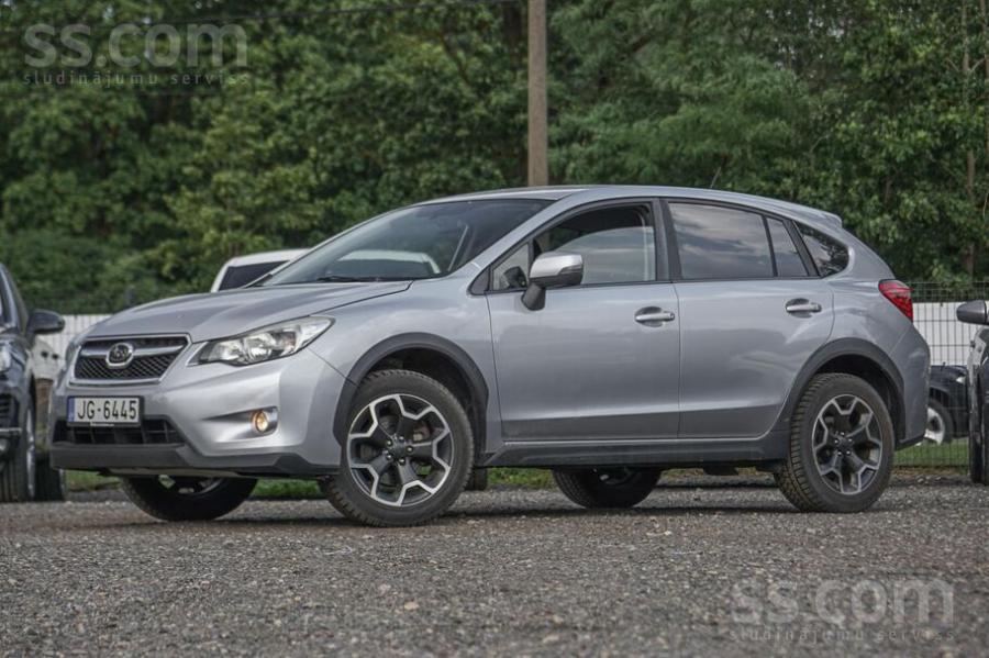 Grey Subaru XV 2013 in Riga, with an engine capacity of 2.00 L and mileage of 292 thousand km for 6590 €, photo 1 on AUTOMOTO.COM.LV