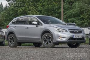 Grey Subaru XV 2013 in Riga, with an engine capacity of 2.00 L and mileage of 292 thousand km for 6590 €, photo 2 on AUTOMOTO.COM.LV