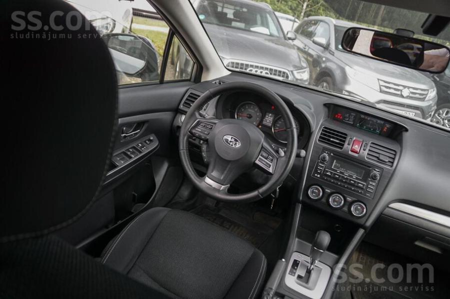 Grey Subaru XV 2013 in Riga, with an engine capacity of 2.00 L and mileage of 292 thousand km for 6590 €, photo 7 on AUTOMOTO.COM.LV
