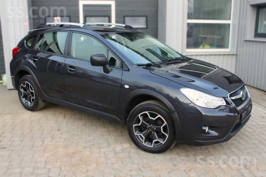 Grey Subaru XV 2014 in Riga, with an engine capacity of 2.00 L and mileage of 0 thousand km for 9750 €, photo 6 on AUTOMOTO.COM.LV