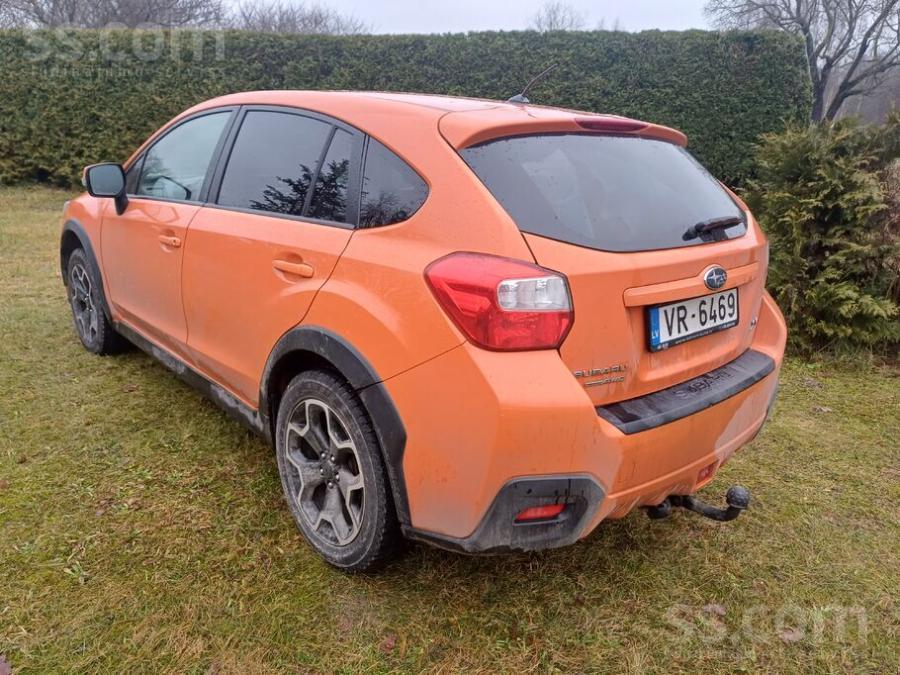 Oranžs Subaru XV 2012 Rīga, ar dzinēja tilpumu 1.60 L un nobraukumu 288 tūkst. km par 6200 €, foto 3 vietnē AUTOMOTO.COM.LV