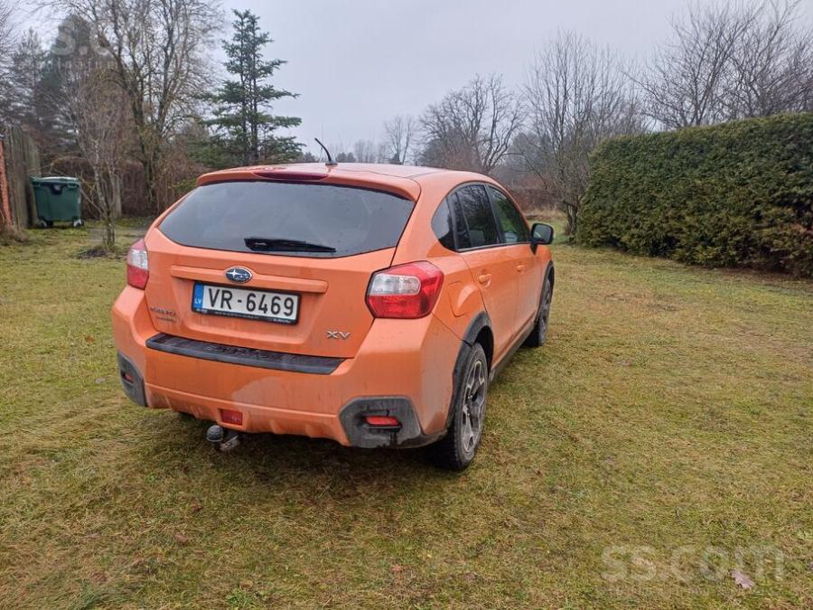Oranžs Subaru XV 2012 Rīga, ar dzinēja tilpumu 1.60 L un nobraukumu 288 tūkst. km par 6200 €, foto 4 vietnē AUTOMOTO.COM.LV