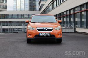 Orange Subaru XV 2012 in Riga, with an engine capacity of 2.00 L and mileage of 213 thousand km for 5980 €, photo 2 on AUTOMOTO.COM.LV