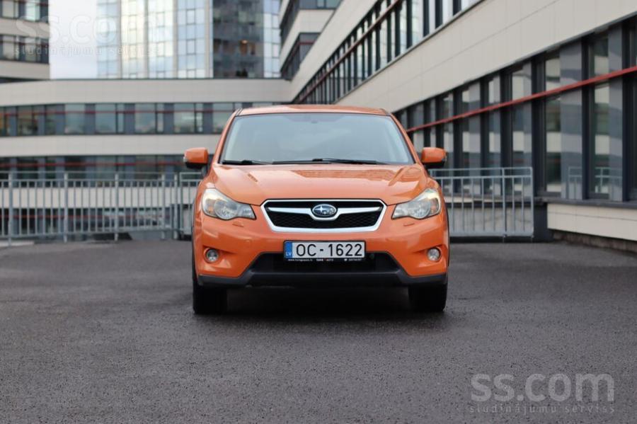 Orange Subaru XV 2012 in Riga, with an engine capacity of 2.00 L and mileage of 213 thousand km for 5980 €, photo 2 on AUTOMOTO.COM.LV