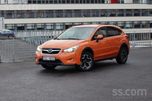Orange Subaru XV 2012 in Riga, with an engine capacity of 2.00 L and mileage of 213 thousand km for 5980 €, photo 3 on AUTOMOTO.COM.LV