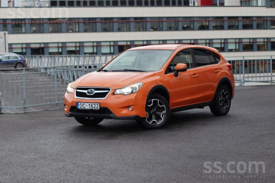 Orange Subaru XV 2012 in Riga, with an engine capacity of 2.00 L and mileage of 213 thousand km for 5980 €, photo 3 on AUTOMOTO.COM.LV