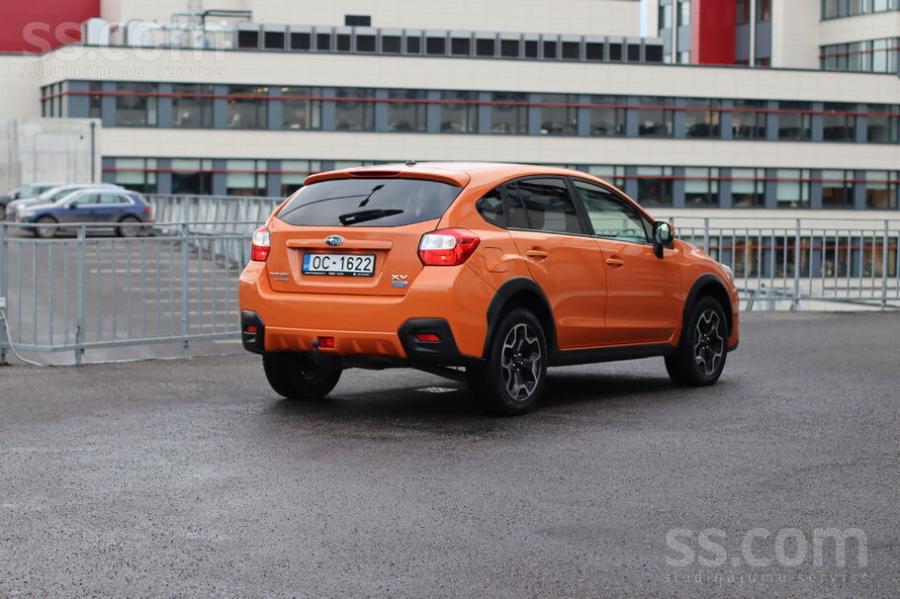 Orange Subaru XV 2012 in Riga, with an engine capacity of 2.00 L and mileage of 213 thousand km for 5980 €, photo 6 on AUTOMOTO.COM.LV