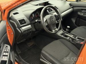 Orange Subaru XV 2012 in Riga, with an engine capacity of 2.00 L and mileage of 213 thousand km for 5980 €, photo 8 on AUTOMOTO.COM.LV