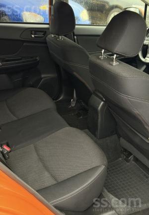 Orange Subaru XV 2012 in Riga, with an engine capacity of 2.00 L and mileage of 213 thousand km for 5980 €, photo 12 on AUTOMOTO.COM.LV