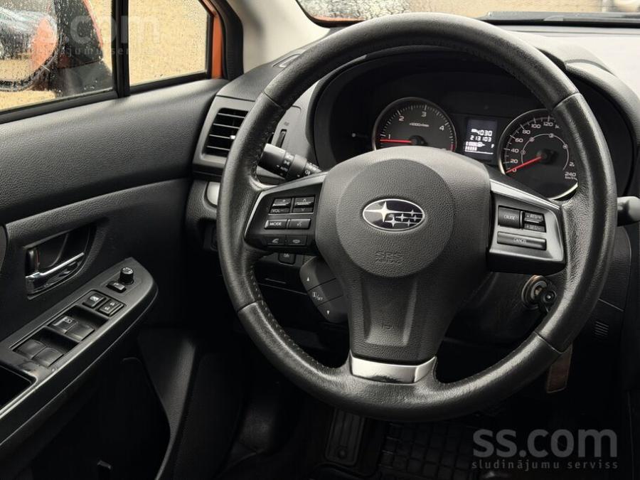 Orange Subaru XV 2012 in Riga, with an engine capacity of 2.00 L and mileage of 213 thousand km for 5980 €, photo 15 on AUTOMOTO.COM.LV