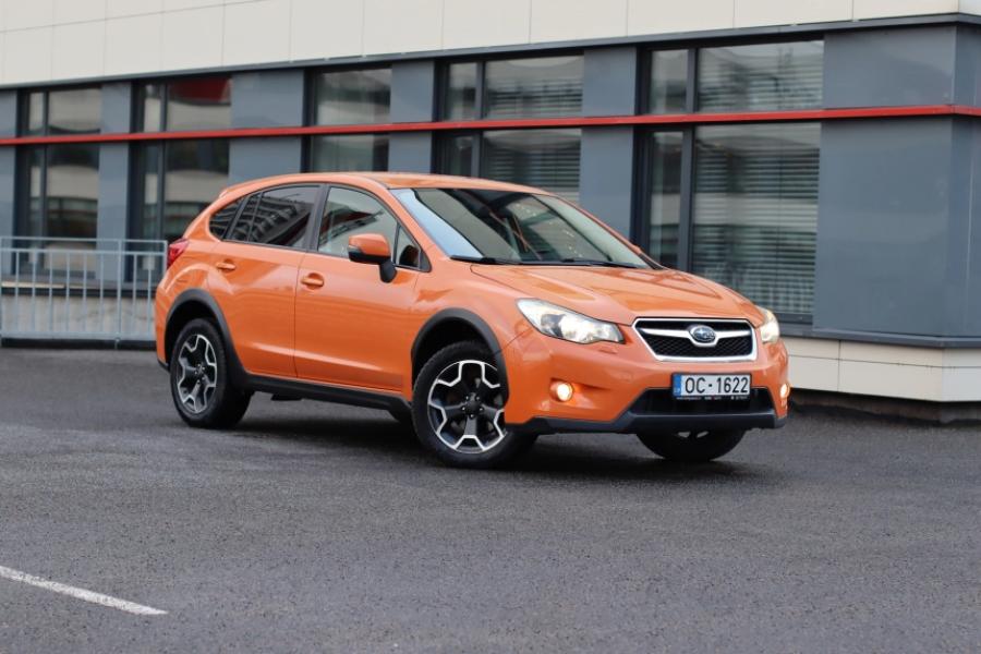 Orange Subaru XV 2012 in Riga, with an engine capacity of 2.00 L and mileage of 213 thousand km for 5980 €, photo 1 on AUTOMOTO.COM.LV