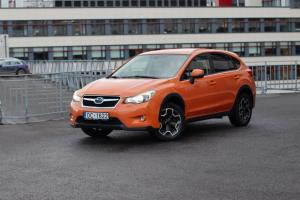 Orange Subaru XV 2012 in Riga, with an engine capacity of 2.00 L and mileage of 213 thousand km for 5980 €, photo 2 on AUTOMOTO.COM.LV