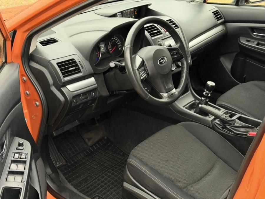 Orange Subaru XV 2012 in Riga, with an engine capacity of 2.00 L and mileage of 213 thousand km for 5980 €, photo 7 on AUTOMOTO.COM.LV