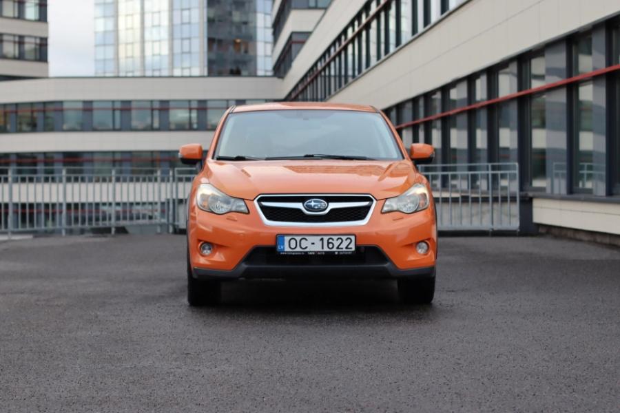 Orange Subaru XV 2012 in Riga, with an engine capacity of 2.00 L and mileage of 213 thousand km for 5980 €, photo 17 on AUTOMOTO.COM.LV