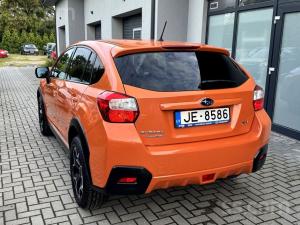 Orange Subaru XV 2013 in Riga, with an engine capacity of 1.60 L and mileage of 157 thousand km for 7700 €, photo 5 on AUTOMOTO.COM.LV