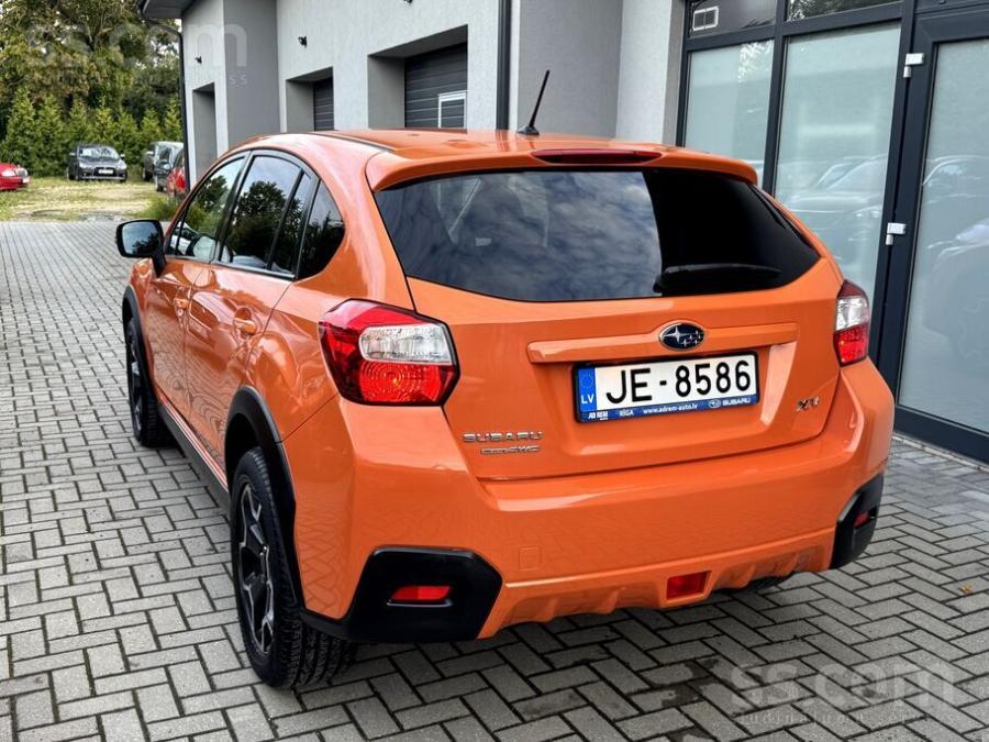 Orange Subaru XV 2013 in Riga, with an engine capacity of 1.60 L and mileage of 157 thousand km for 7700 €, photo 5 on AUTOMOTO.COM.LV