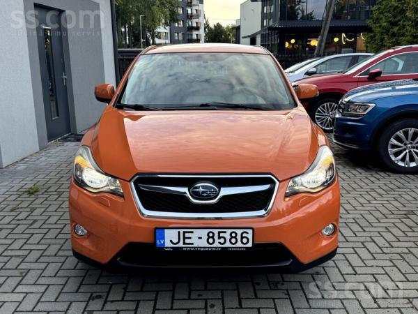 Orange Subaru XV 2013 in Riga, with an engine capacity of 1.60 L and mileage of 157 thousand km for 7700 €, photo 6 on AUTOMOTO.COM.LV