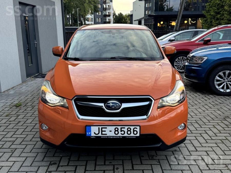 Orange Subaru XV 2013 in Riga, with an engine capacity of 1.60 L and mileage of 157 thousand km for 7700 €, photo 7 on AUTOMOTO.COM.LV