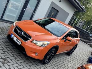 Orange Subaru XV 2013 in Riga, with an engine capacity of 1.60 L and mileage of 157 thousand km for 7700 €, photo 8 on AUTOMOTO.COM.LV