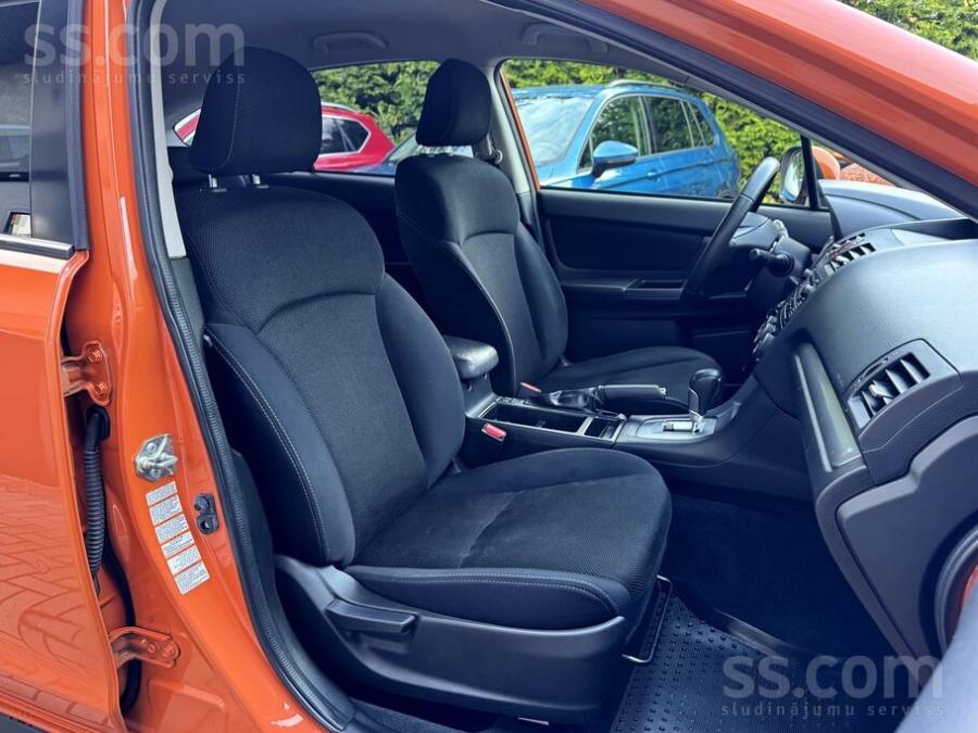 Orange Subaru XV 2013 in Riga, with an engine capacity of 1.60 L and mileage of 157 thousand km for 7700 €, photo 9 on AUTOMOTO.COM.LV