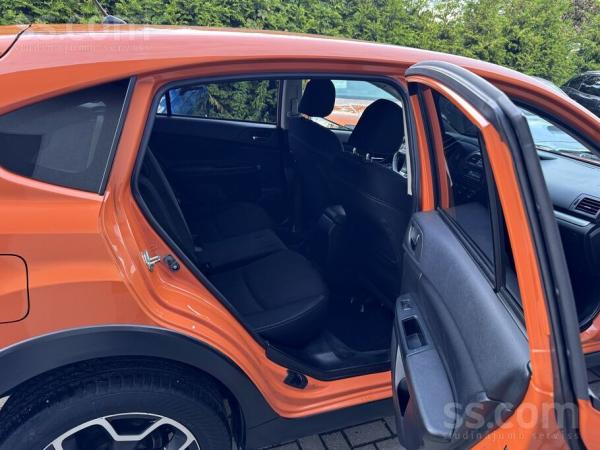 Orange Subaru XV 2013 in Riga, with an engine capacity of 1.60 L and mileage of 157 thousand km for 7700 €, photo 9 on AUTOMOTO.COM.LV