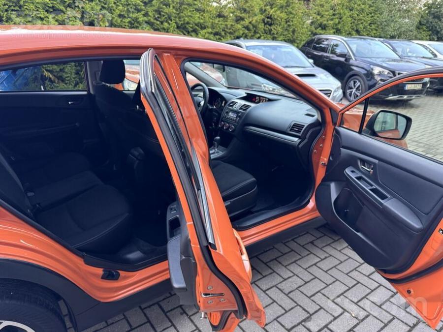 Orange Subaru XV 2013 in Riga, with an engine capacity of 1.60 L and mileage of 157 thousand km for 7700 €, photo 11 on AUTOMOTO.COM.LV